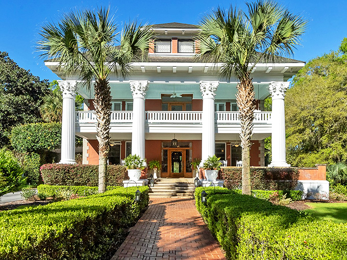 The Herlong Mansion stands like a Southern belle in architectural form, its stately columns and manicured gardens whispering tales of old Florida wealth. 