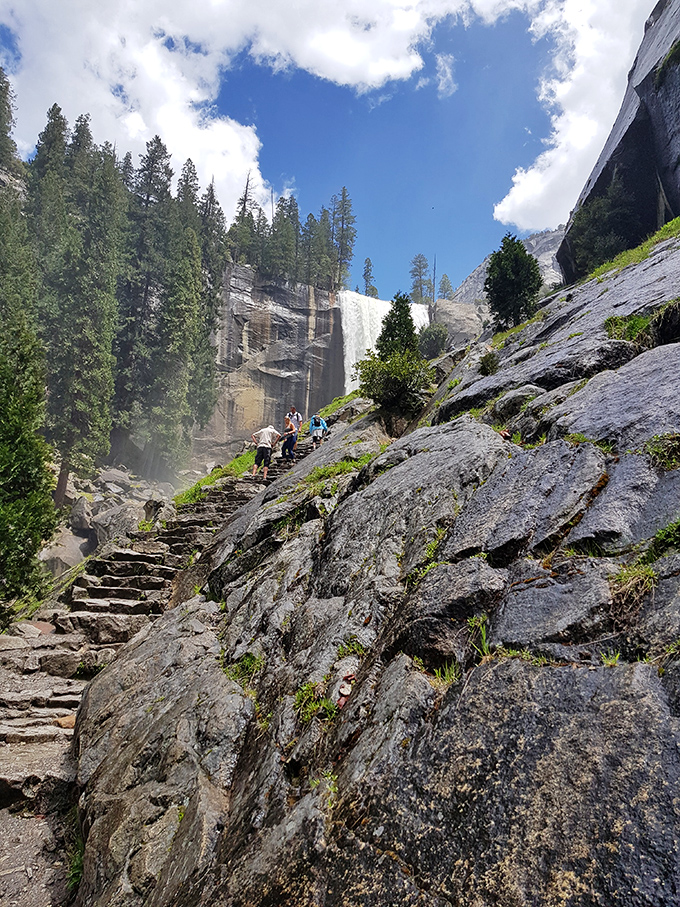 The granite steps that separate dreamers from achievers - each one a small victory toward something spectacular.