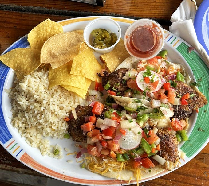 These fish tacos aren't just a meal, they're a tropical vacation for your taste buds&mdash;fresh pico de gallo and island spices dancing atop perfectly seasoned fish.