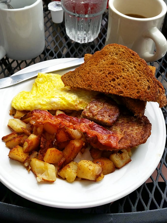 Breakfast of champions: golden hash browns with the perfect crisp-to-tender ratio, eggs that actually taste like eggs, and bacon that would make a vegetarian reconsider.
