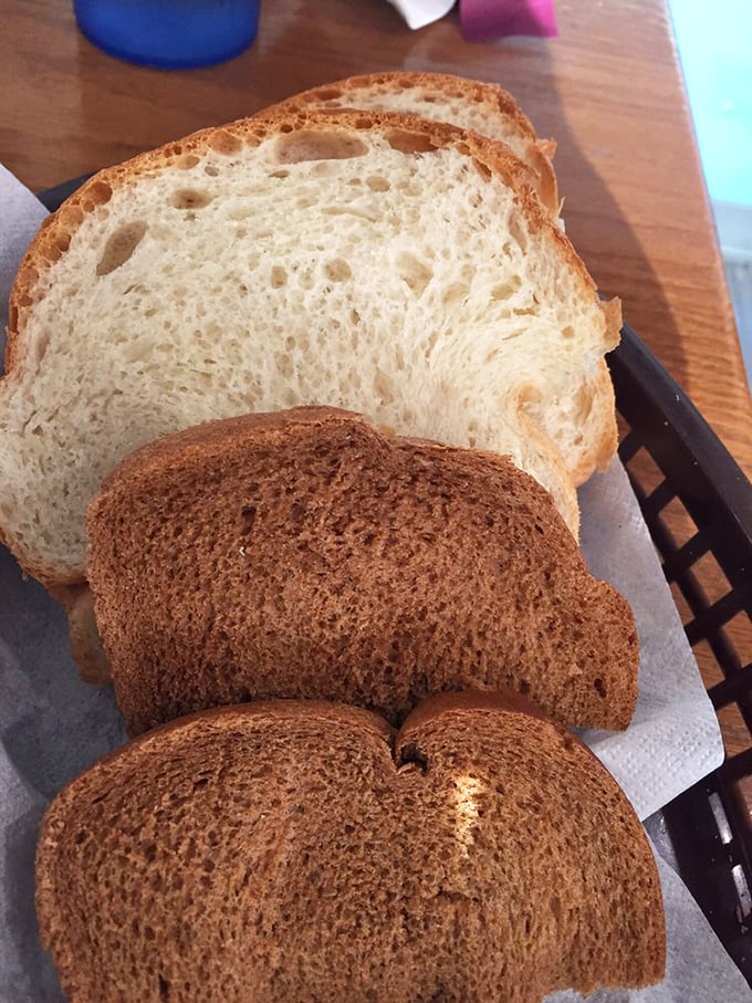 Bread so fresh you can almost hear it singing. The perfect vehicle for sopping up every last drop of that legendary gravy.