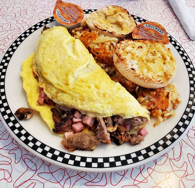 Breakfast perfection doesn't exi&mdash; Oh wait, it does! This fluffy omelet with all the fixings and golden hash browns would make morning people of us all.