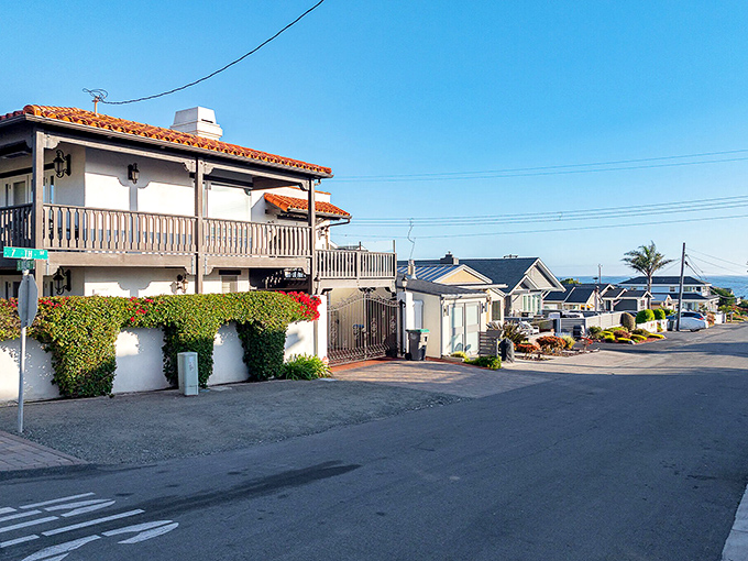 Spanish-style architecture meets beach town living on streets where neighbors still wave and ocean views are the ultimate status symbol.