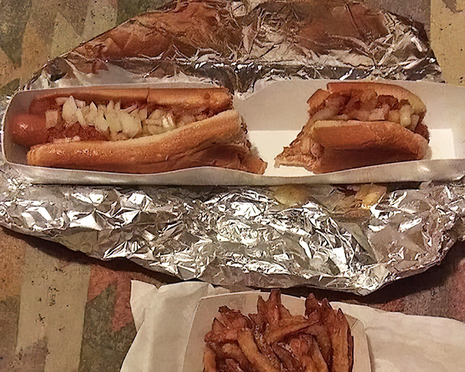 Hot dogs here aren't just fast food&mdash;they're fast comfort. Nestled in soft buns and topped with just enough onions, they're proof that simplicity often trumps complexity.