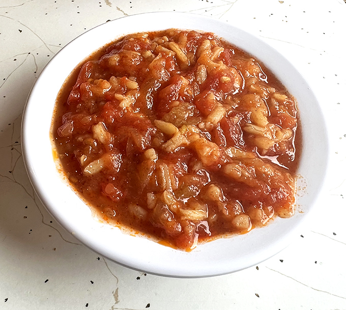 The famous hot rice isn't just a side dish; it's a tomato-infused revelation that's converted thousands to the Church of Barberton Chicken.