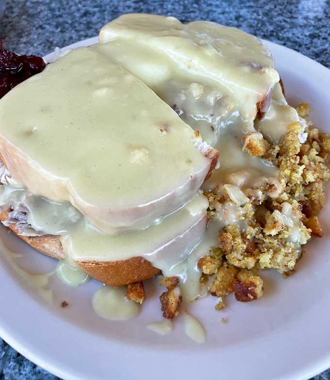Behold the hot turkey sandwich&mdash;where gravy isn't just a topping but a warm, savory blanket tucking in layers of house-roasted turkey and stuffing.