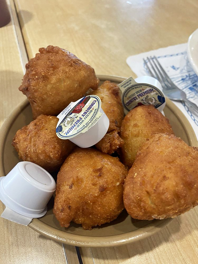 Hush puppies so good they deserve their own fan club. These golden orbs of cornmeal joy are the perfect seafood sidekick.