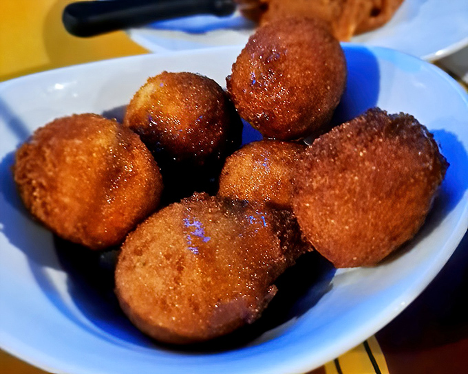 These aren't just hush puppies—they're golden orbs of cornmeal joy. Crispy outside, fluffy inside, they're the supporting actors that sometimes steal the whole show.