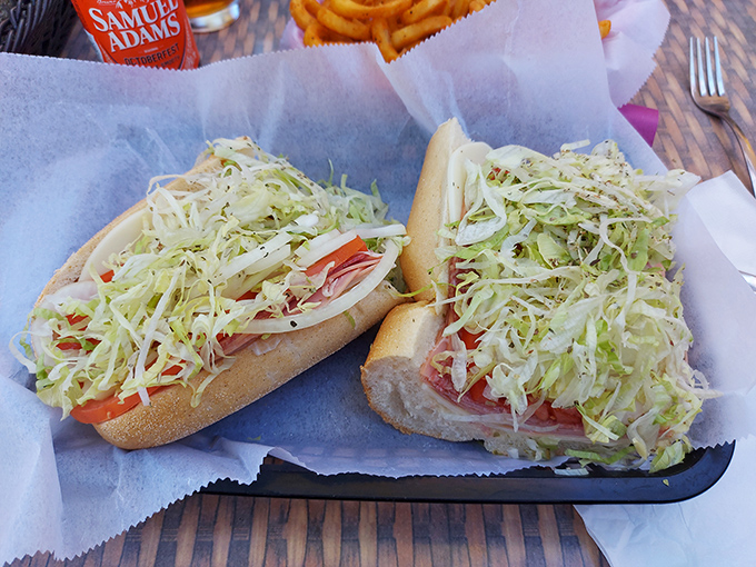 The Italian hoagie &ndash; a masterclass in sandwich architecture with layers of meat, cheese, and shredded lettuce that would make any deli counter worker weep with pride.