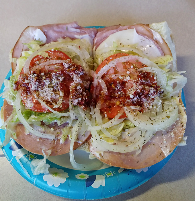 Layer upon layer of Italian goodness. This isn't just a sandwich&mdash;it's architecture with ingredients that would make any nonna nod in approval.