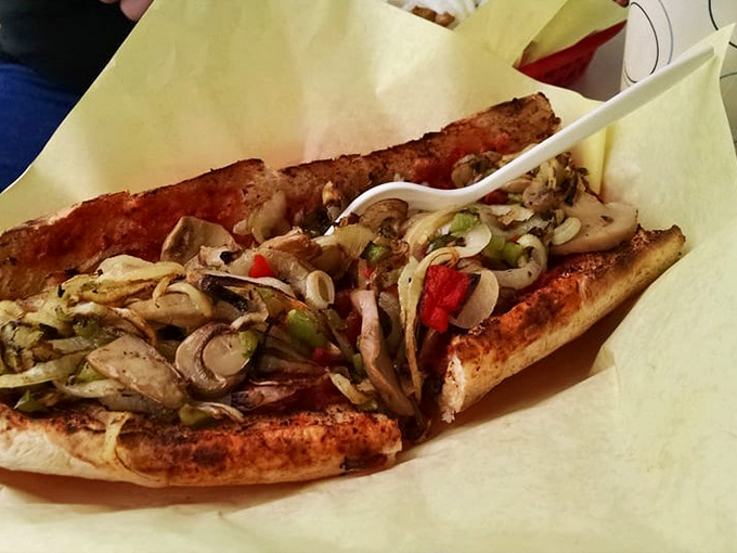 Italian sausage meets pizza in this glorious fusion that would make both countries proud of their collaboration.