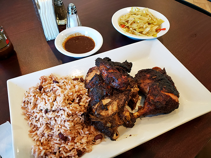 Jerk chicken done right – smoky, spicy, and complex enough to make you book a flight to Jamaica or just drive back tomorrow.