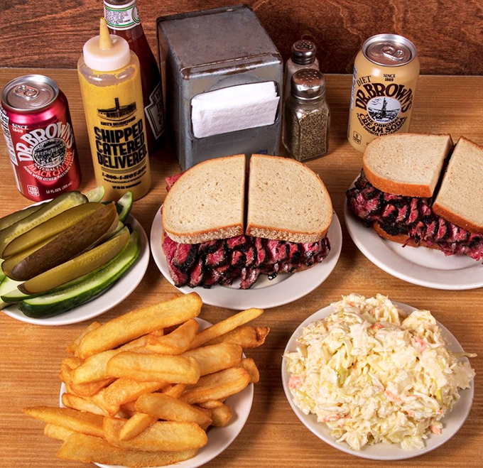A proper deli spread that would make your grandmother nod in approval&mdash;towering sandwiches, crisp pickles, golden fries, and coleslaw that doesn't know the meaning of "afterthought."