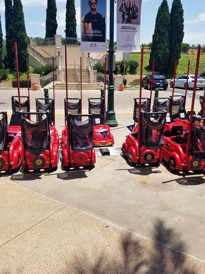 Kid-sized fire engines for rent&mdash;because nothing says "premium shopping experience" like bribing your children with miniature emergency vehicles.