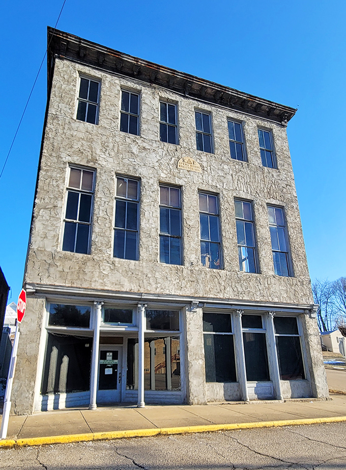 This stately stone building stands as a testament to Shawnee's prosperous past. Windows like watchful eyes have witnessed over a century of small-town life.