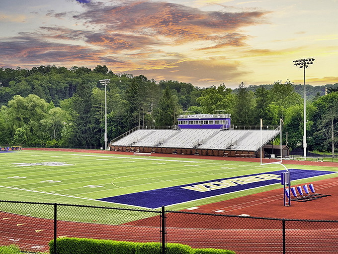 Friday night lights at Knox Stadium, where local legends are born and the concession stand hot chocolate somehow tastes better than any fancy city café.