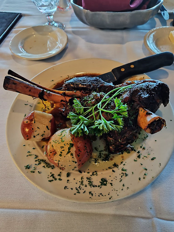 This lamb chop isn't just dinner; it's a work of art with a bone handle that says, "Go ahead, pick me up. Emily Post isn't watching."