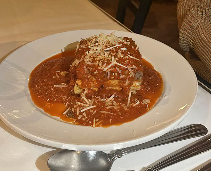 Lasagna so perfectly layered, it could teach a masterclass in structural engineering and deliciousness.