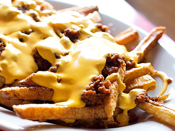 Loaded fries that answer the eternal question: "Can cheese sauce make everything better?" The answer is a resounding yes.