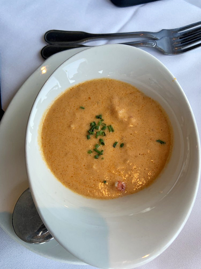 This lobster bisque doesn't just warm your stomach&mdash;it hugs your soul with each velvety spoonful, tiny chunks of lobster playing hide-and-seek throughout.