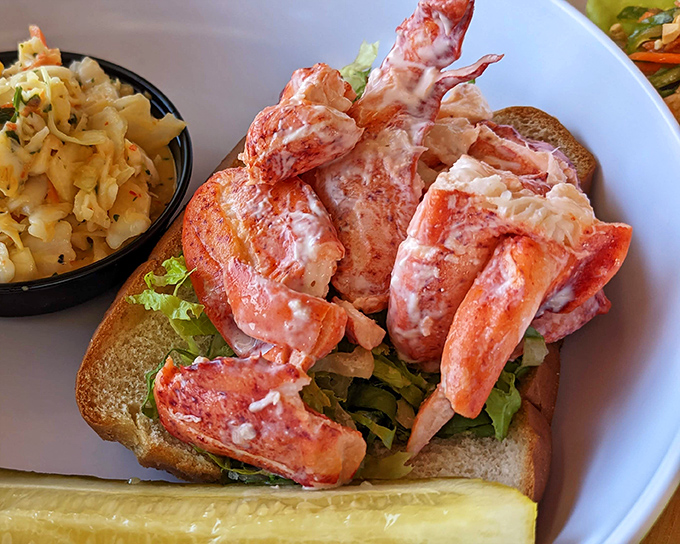 Lobster roll heaven! Chunks of sweet meat nestled in a perfectly toasted bun &ndash; the kind of sandwich that makes you consider moving to Maine.
