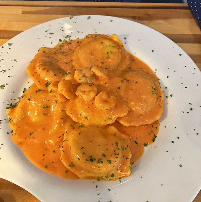 These lobster ravioli swim in a sauce so luxurious it should come with its own tiny gold necklace and sports car.