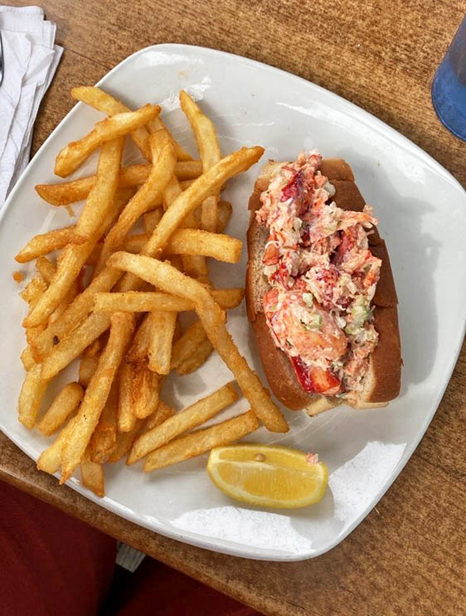 The lobster roll &ndash; where Maine tradition meets Carolina hospitality, with fries that deserve their own fan club.