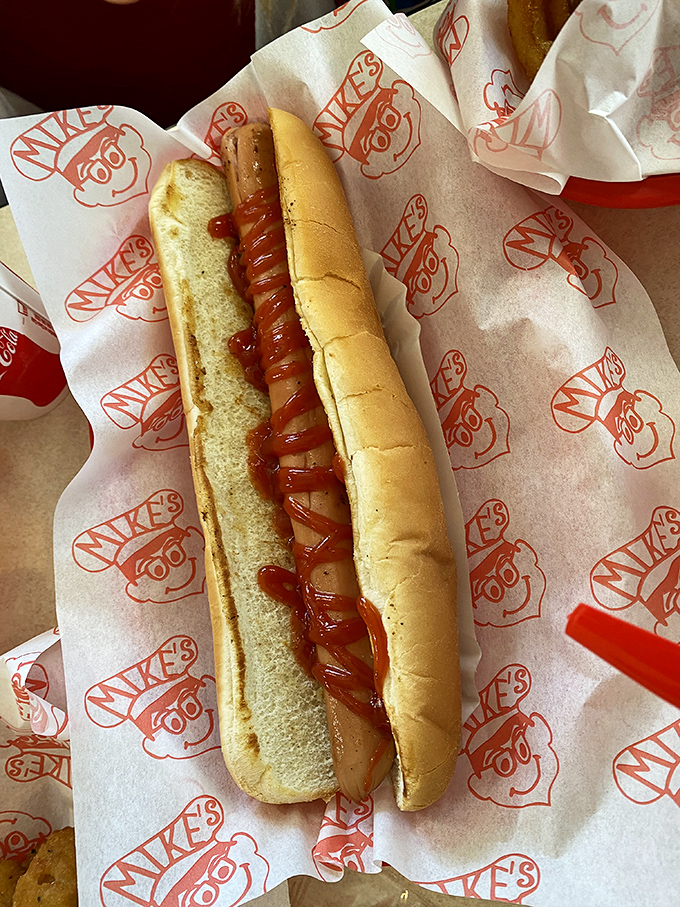 The hot dog at Mike's lies in wait like a delicious torpedo of flavor, ready to launch your taste buds into orbit.