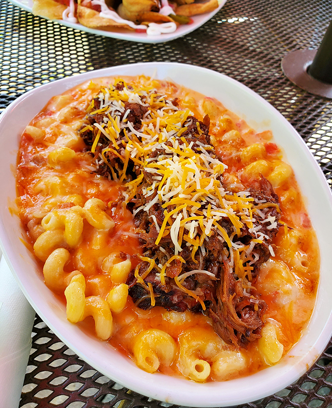 Mac and cheese gets the royal treatment with a crown of pulled pork &ndash; comfort food having a fancy night out.