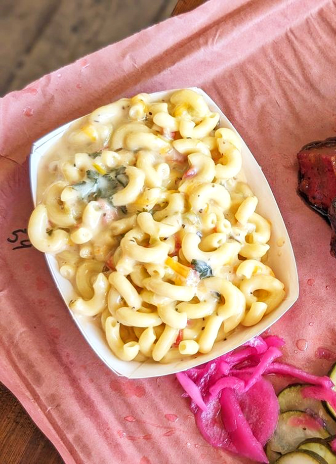 Mac and cheese that doesn't know it came from a food cart. This creamy, cheesy masterpiece would make your grandmother question her own recipe.