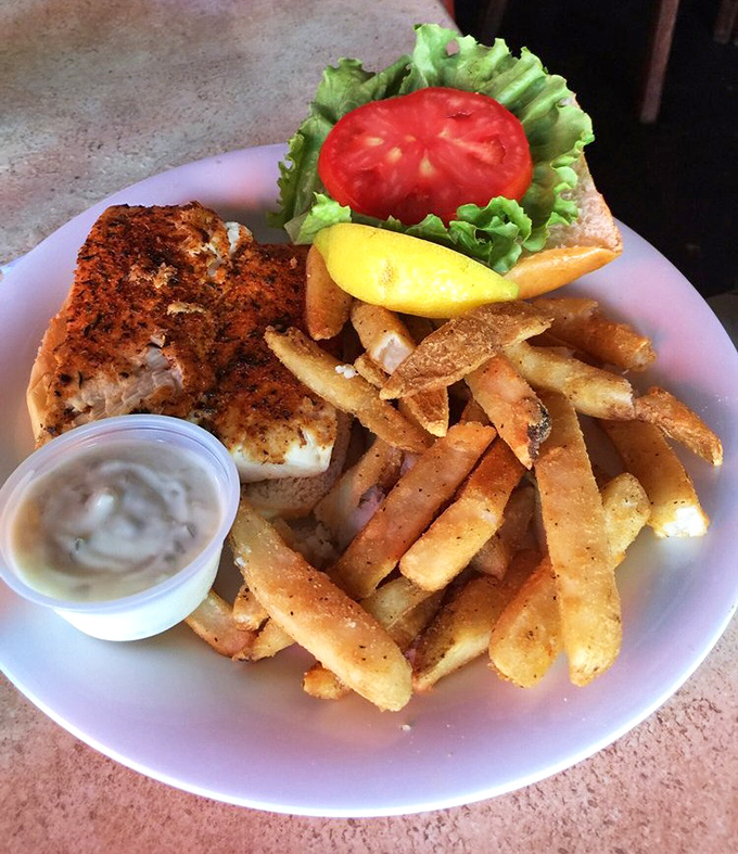 Blackened fish sandwich with fries&mdash;the beach vacation your taste buds have been dreaming about. Simple perfection that needs no fancy explanation.