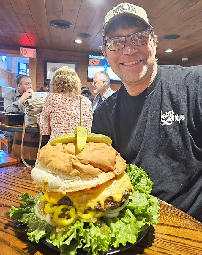 "I'd like a burger with a side of bragging rights, please." When your sandwich requires two hands and a strategy session, you know you're at Denny's Beer Barrel Pub.