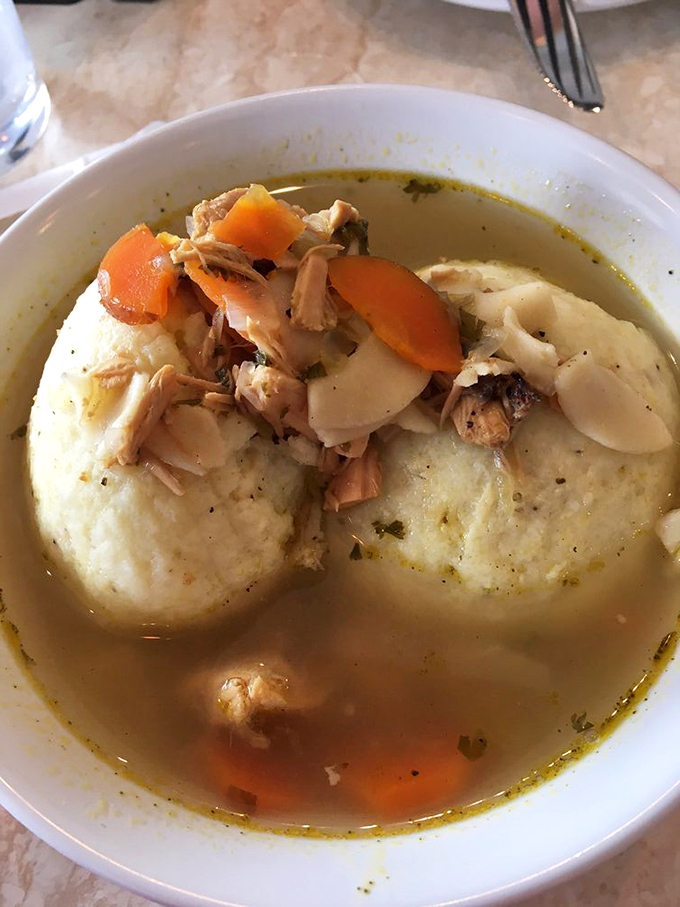 Matzo ball soup that could heal whatever ails you&mdash;two fluffy dumplings floating in golden broth like edible life preservers.