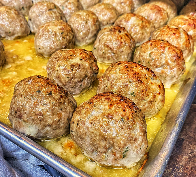 These homemade meatballs aren't just food; they're time machines to Sunday dinners at an Italian grandmother's house you wish you had.