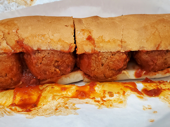 This meatball sub isn't just a sandwich; it's a warm, saucy hug on bread that would make any Italian grandmother nod in approval.