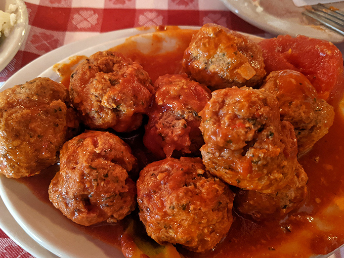 "Meatballs Bucharest" swimming in spicy tomato sauce&mdash;like little flavor bombs waiting to detonate on your taste buds.