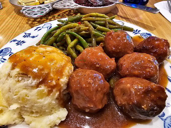 Swedish meatballs that would make IKEA jealous, bathed in savory gravy alongside green beans and mashed potatoes. Comfort food with a passport.