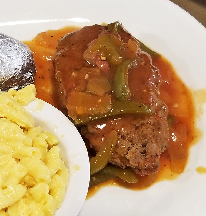 Comfort food that doesn't need a filter. This meatloaf with savory gravy and mac and cheese would make your grandmother both proud and jealous.