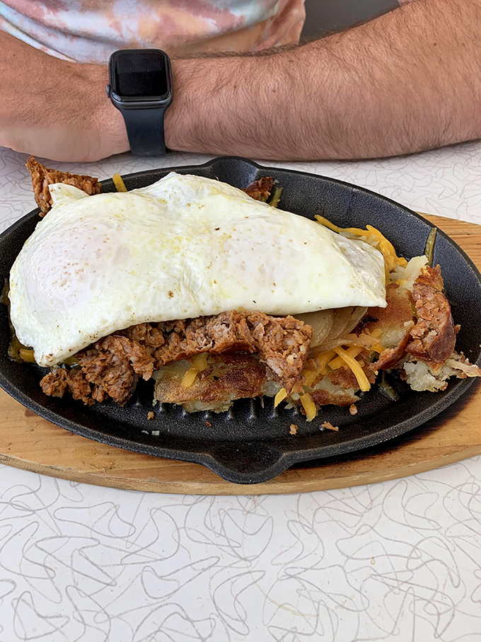 This isn't just meatloaf&mdash;it's a skillet-served masterpiece topped with a blanket of melted cheese and eggs. Comfort food that hugs you from the inside.