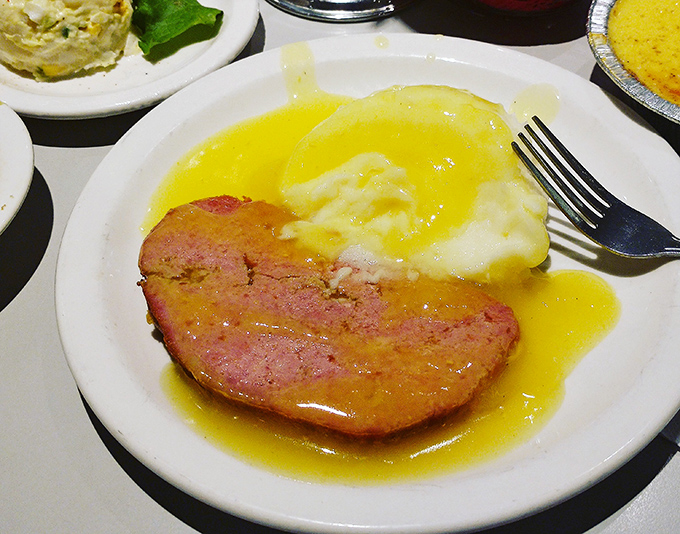 The meatloaf and mashed potatoes swim in a lake of golden gravy&mdash;a combination so classic it should have its own spot on the periodic table of comfort foods.