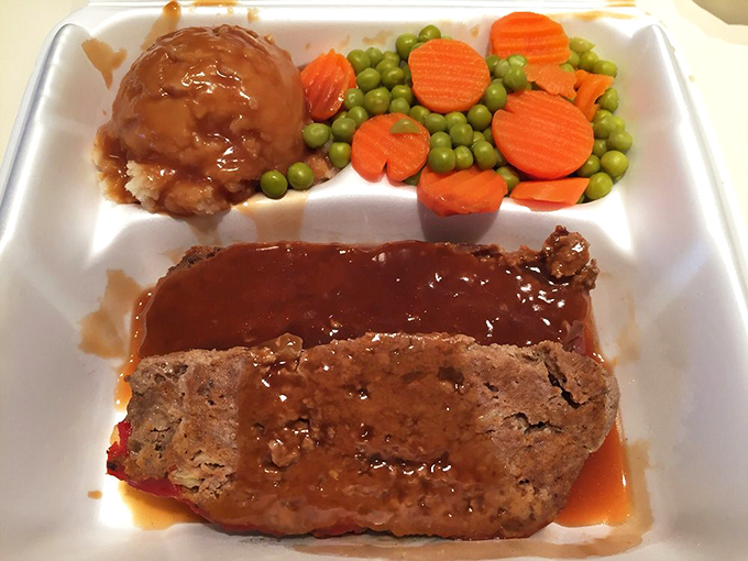 Meatloaf that would make your grandmother both jealous and proud, swimming in gravy that deserves its own fan club.