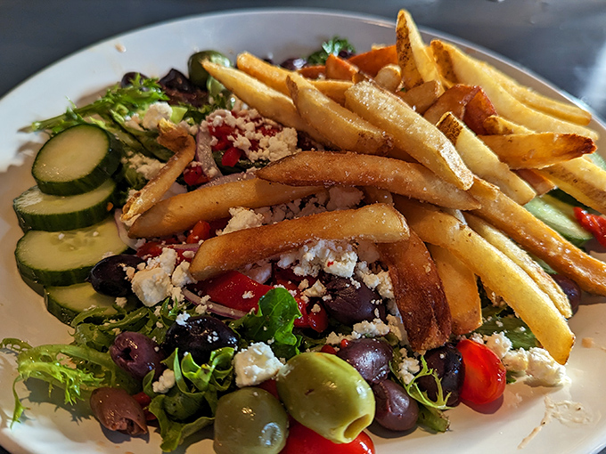 A Mediterranean salad that actually makes you excited about eating vegetables&mdash;crisp, colorful, and proof that fries and salad can peacefully coexist on one plate.