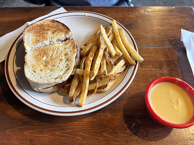 This sandwich isn't just lunch&mdash;it's an architectural achievement of toasty bread, melted cheese, and hand-cut fries that would make Frank Lloyd Wright jealous.