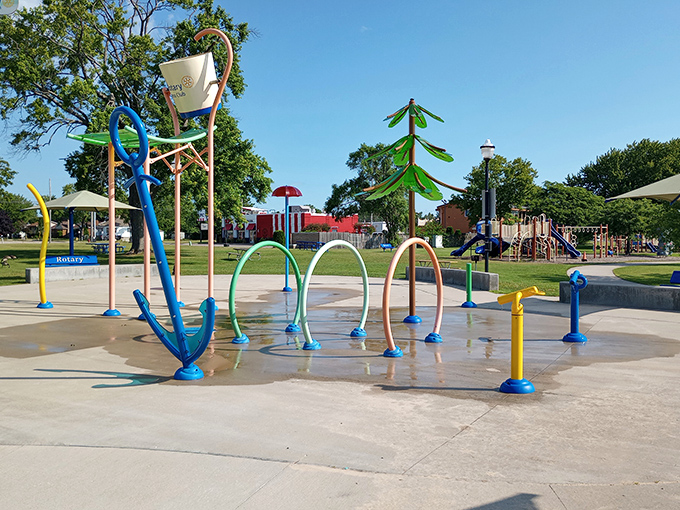 Mich-e-ke-wis Park's splash pad proves you're never too old to appreciate the simple joy of unexpected water jets on a hot summer day.