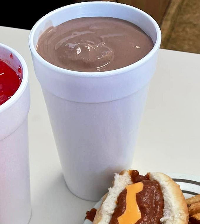 The chocolate shake arrives in a humble styrofoam cup, not some fancy glass, because they're too busy perfecting what's inside to worry about presentation.