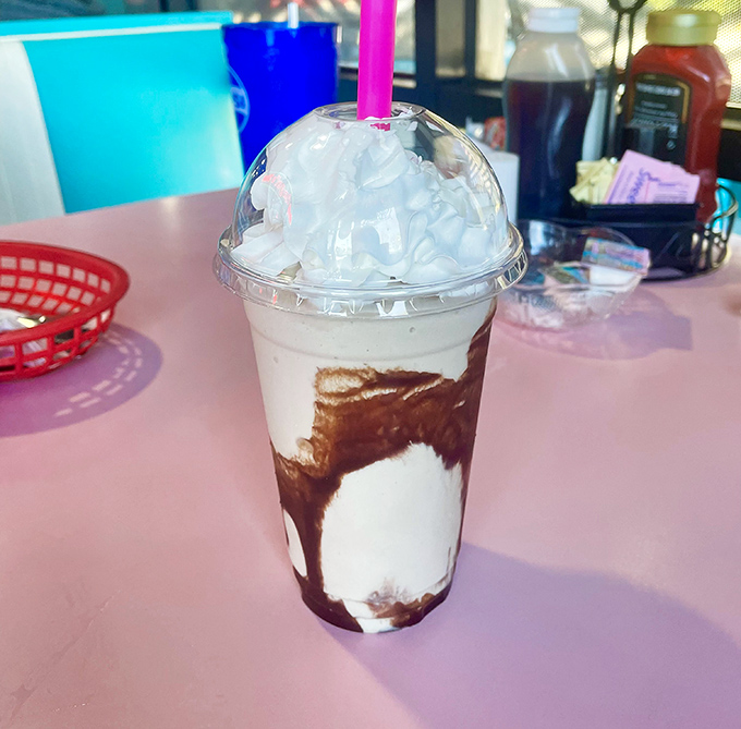 Chocolate and vanilla swirl together in perfect harmony, topped with whipped cream that defies gravity. Diet plans, consider yourselves postponed.