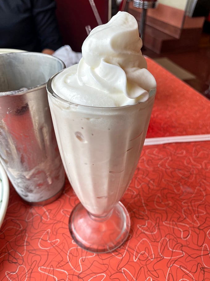 A milkshake so thick you'll need a spoon first—this cloud-topped classic is what childhood dreams and adult cheat days are made of.