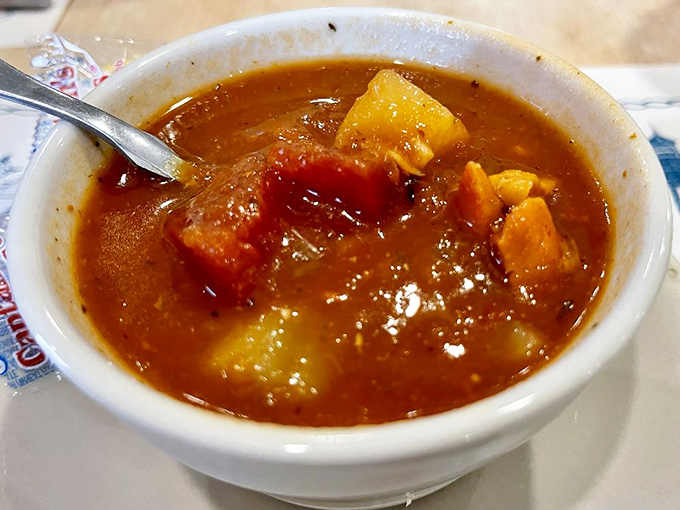 Minorcan clam chowder: where tomato-based broth meets datil pepper heat. It's St. Augustine history in a bowl, and resistance is futile.