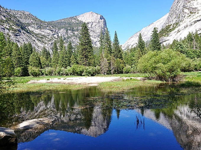 Mirror Lake reflects Yosemite's majesty like nature's own postcard, no Instagram filter required.