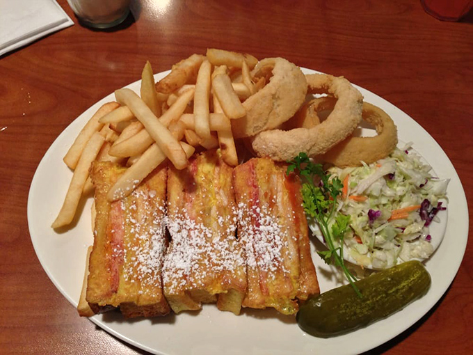 The Monte Cristo: where breakfast and lunch collide in a powdered-sugar dusted miracle that makes you question why we separate meals at all.